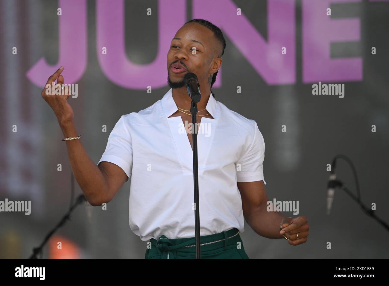 William Rhem, Jr. performs a spoken word number during the Fourth ...