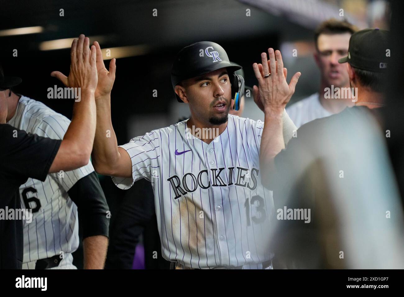 June 18 2024: Rockies second baseman Alan Trejo (13) scores a run ...