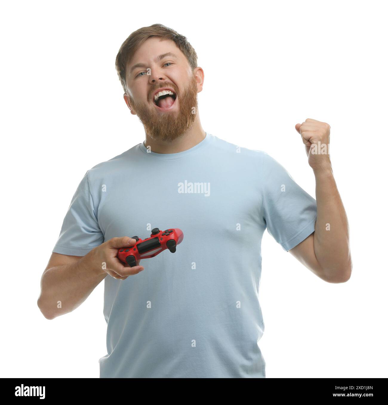 Emotional man with game controller on white background Stock Photo - Alamy