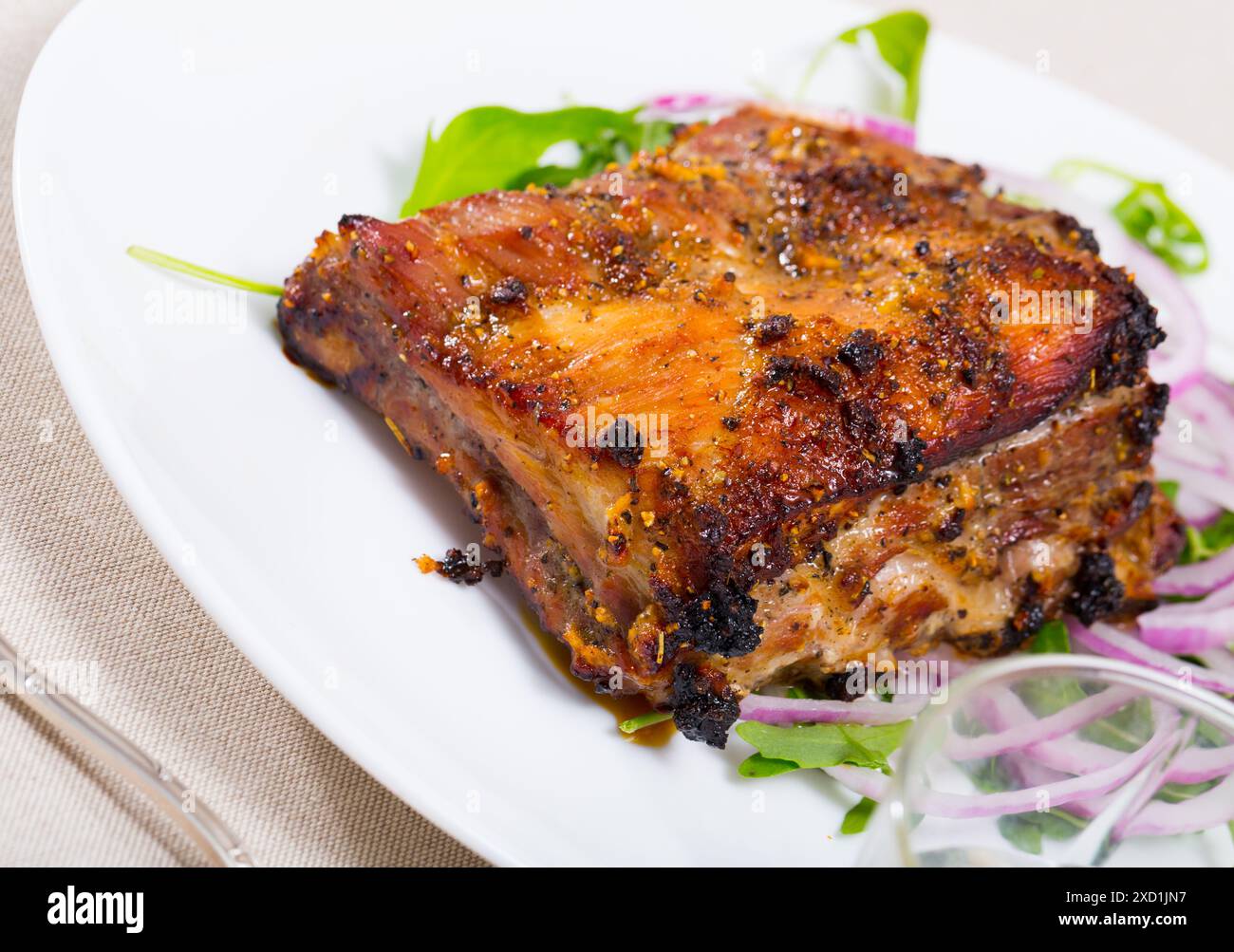 Roasted rack of pork Stock Photo - Alamy