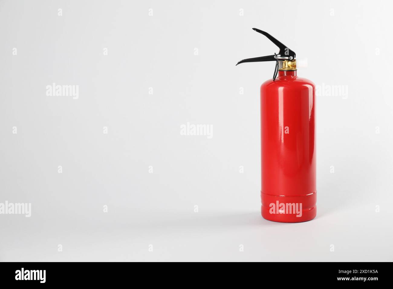 One red fire extinguisher on white background, space for text Stock ...