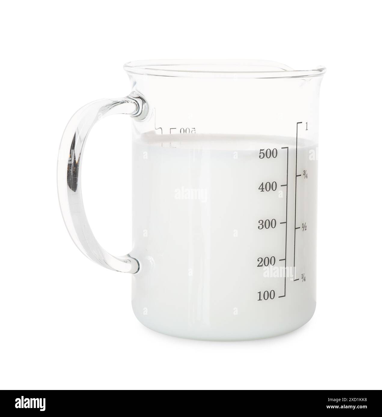 Fresh milk in measuring cup isolated on white Stock Photo - Alamy