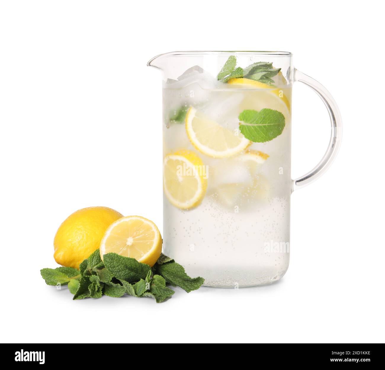 Freshly made lemonade with mint in jug isolated on white Stock Photo ...