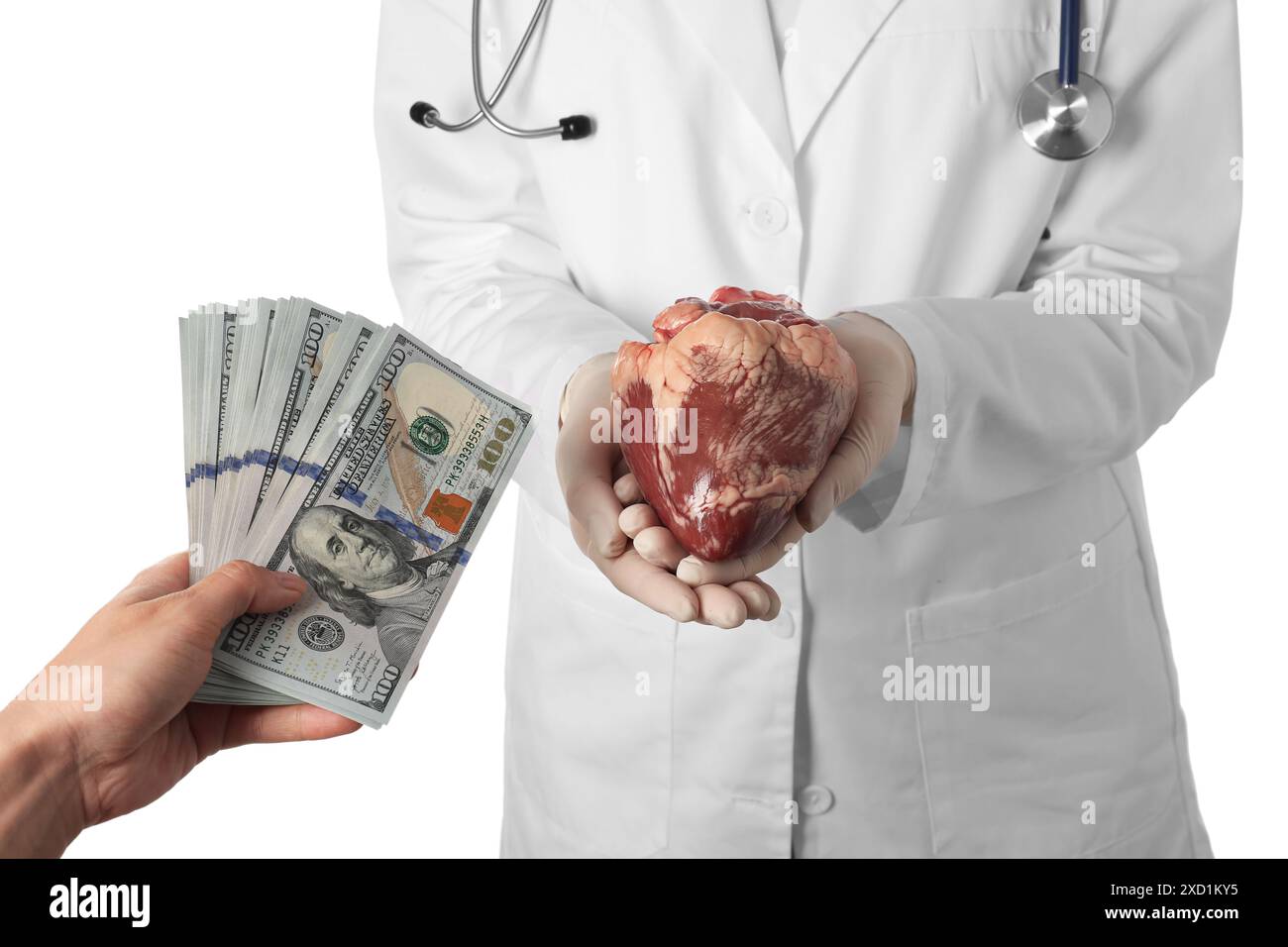 Patient giving dollar banknotes to doctor with heart on white ...