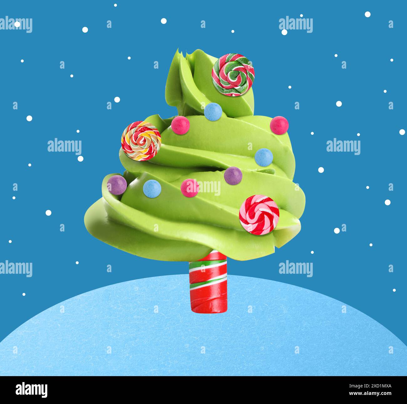 Christmas tree of green cream and sweet candies on blue background with ...