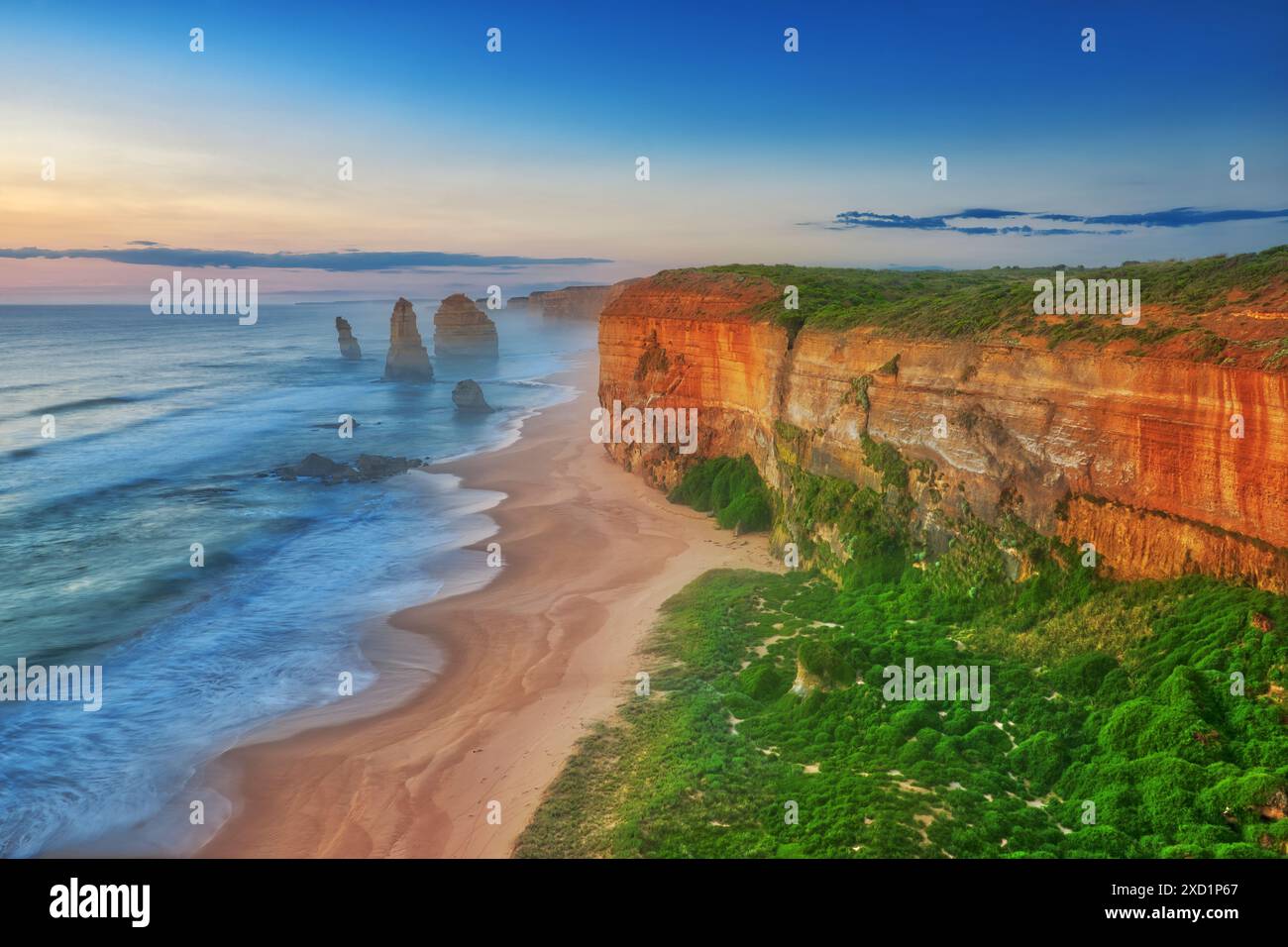 The stunning Twelve Apostles and limestone cliffs at twilight, Port ...