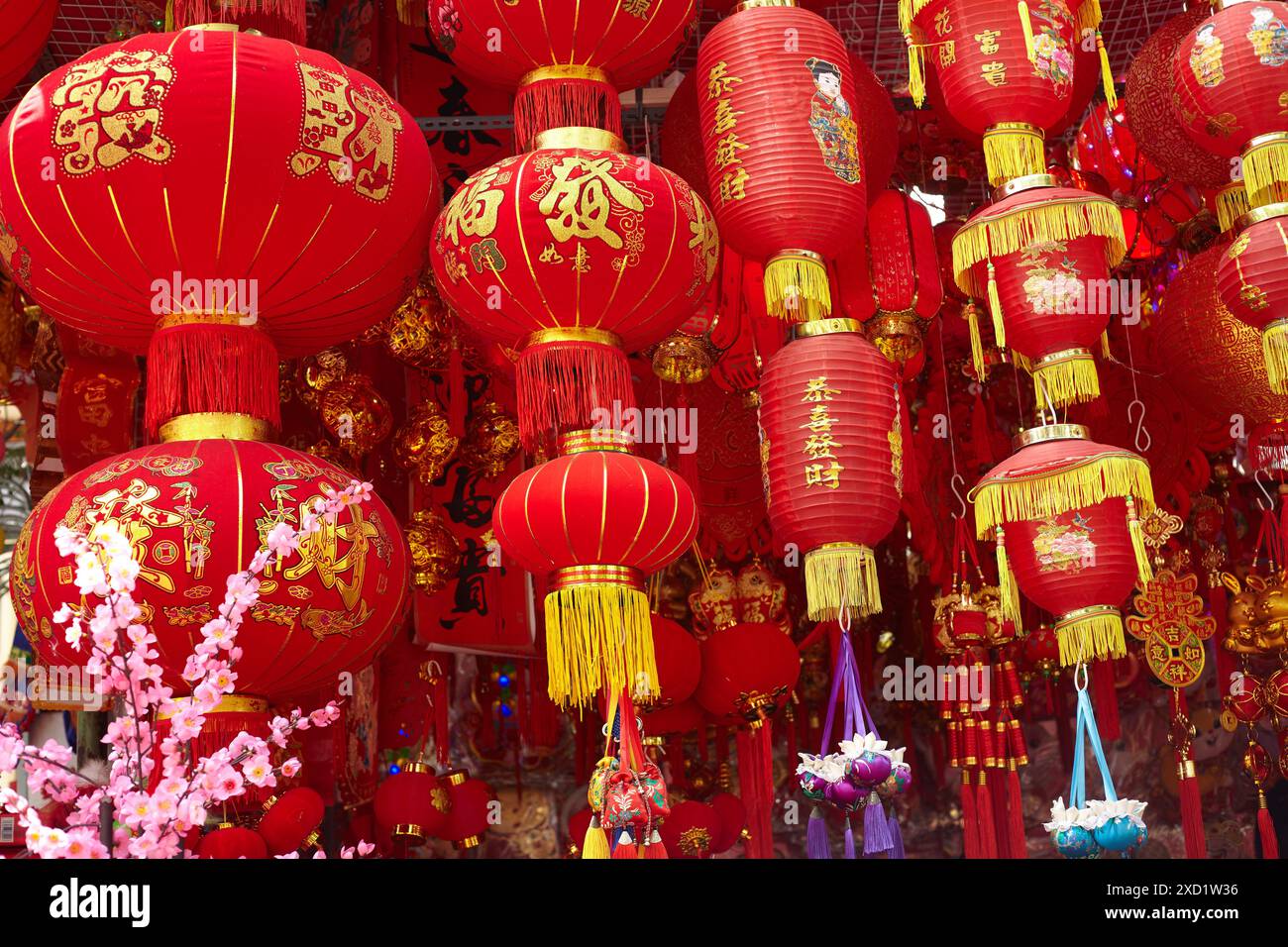 Chinese New Year decorations and lanterns in the market, containing ...