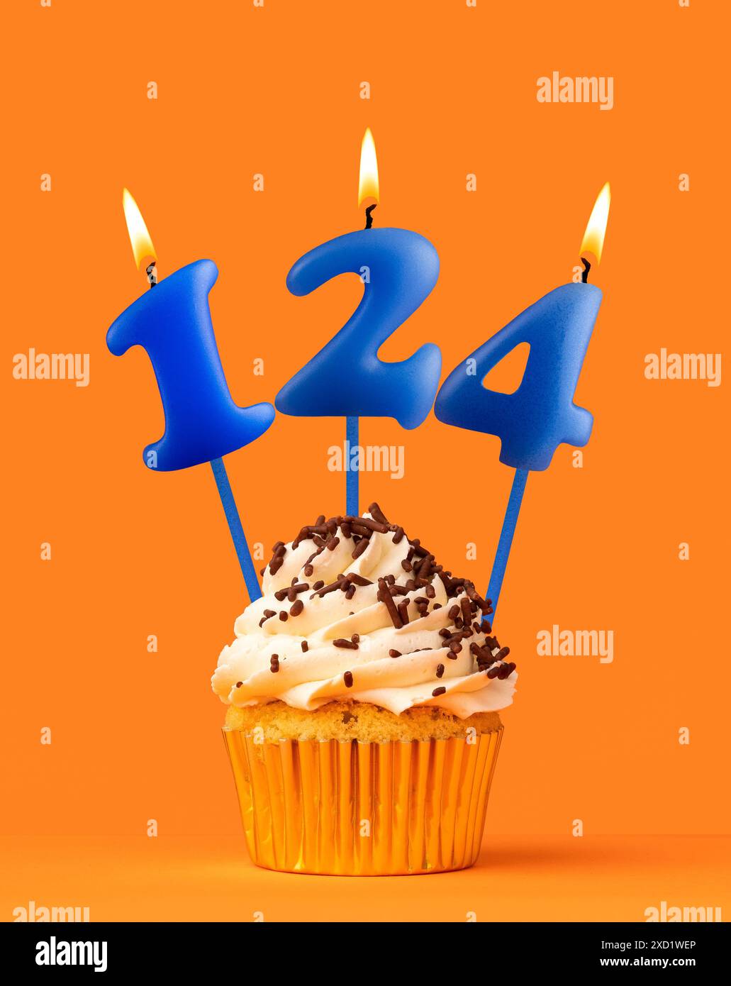 Blue birthday candle and cupcake - Number 124 Stock Photo - Alamy