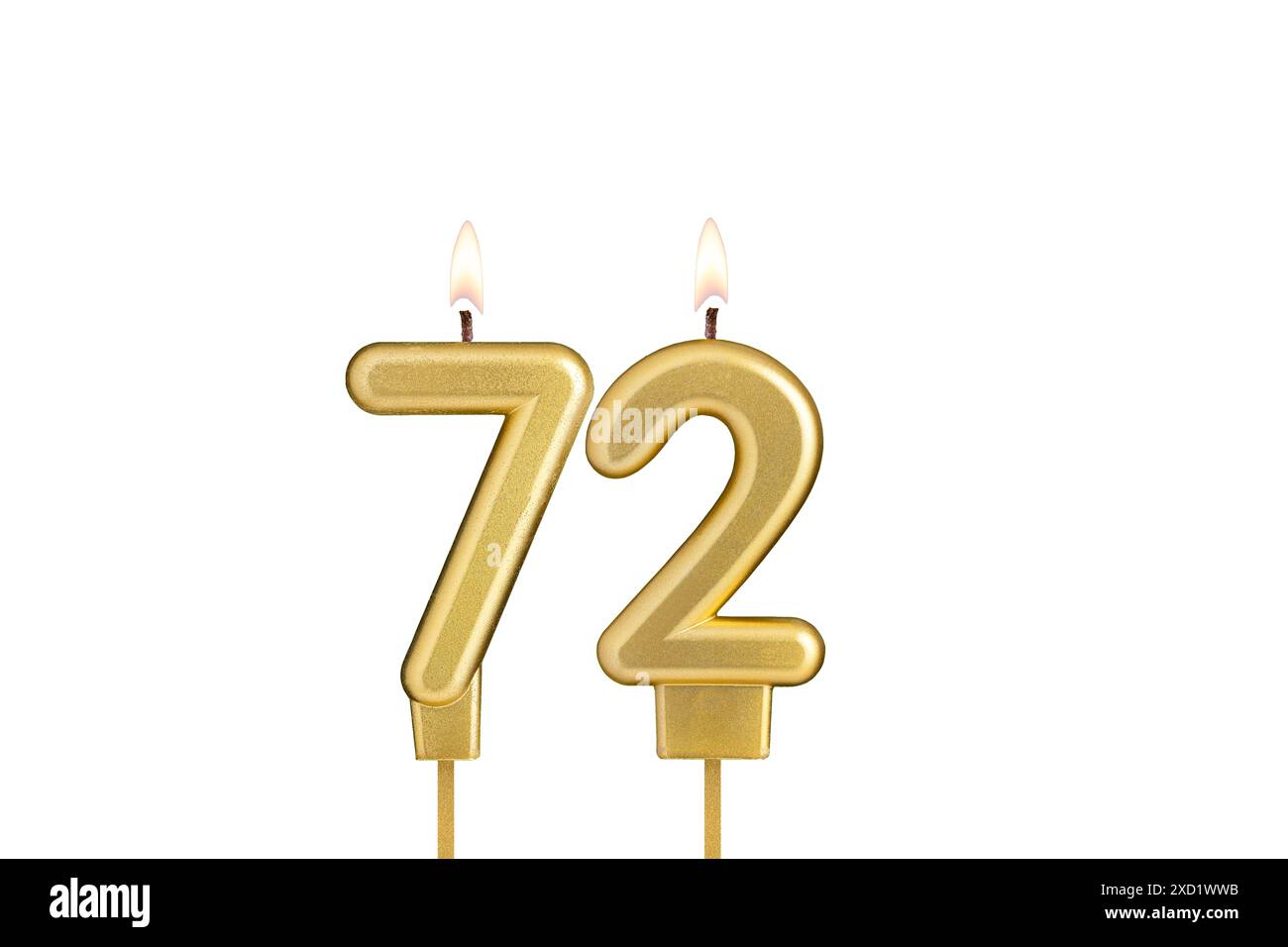 Golden number 72 birthday candle on white background Stock Photo - Alamy