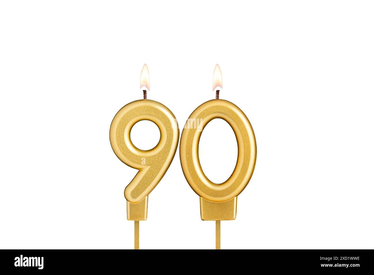 Golden number 90 birthday candle on white background Stock Photo - Alamy