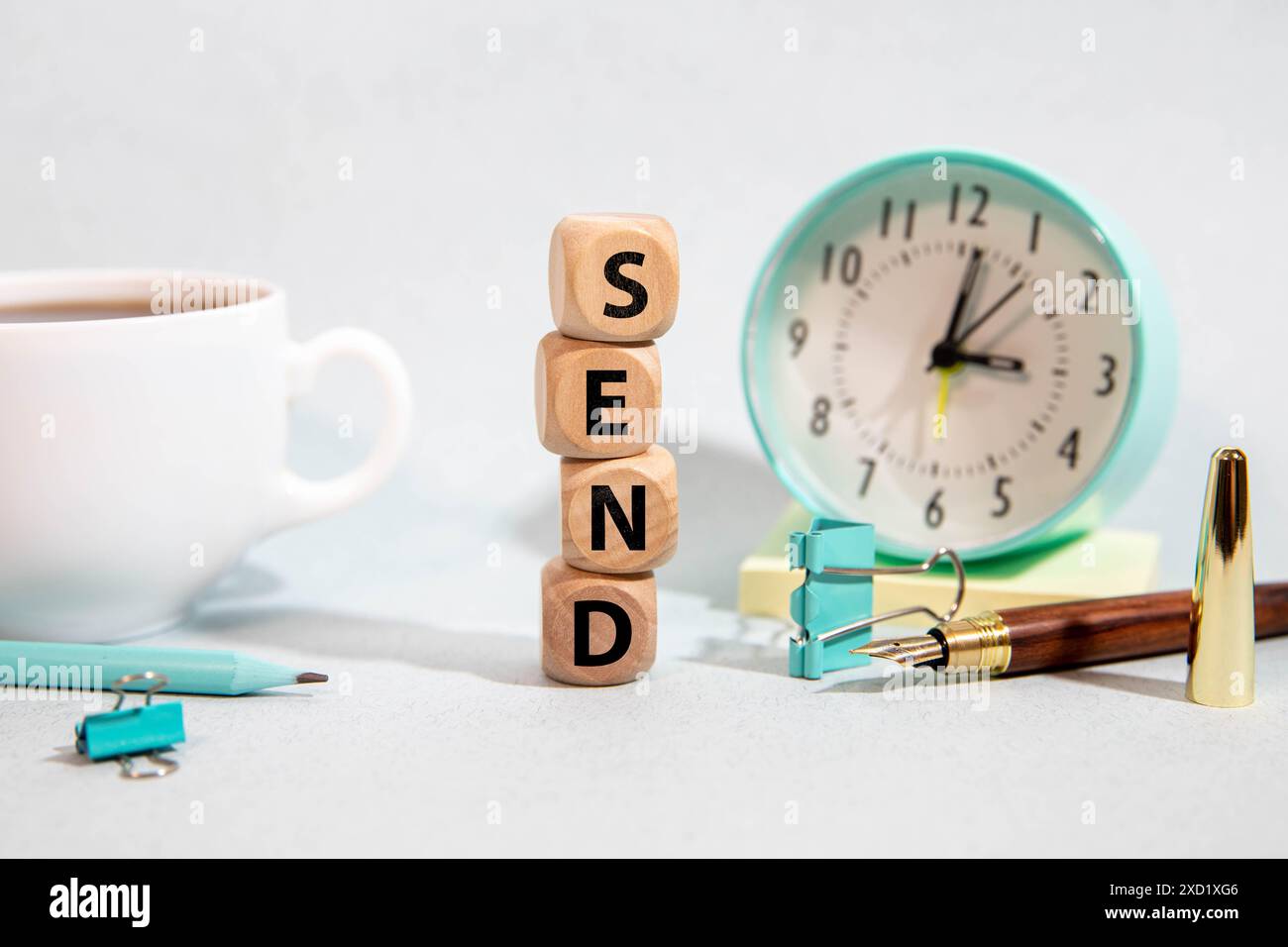 The word SEND. Wooden cubes with letters isolated on white background ...