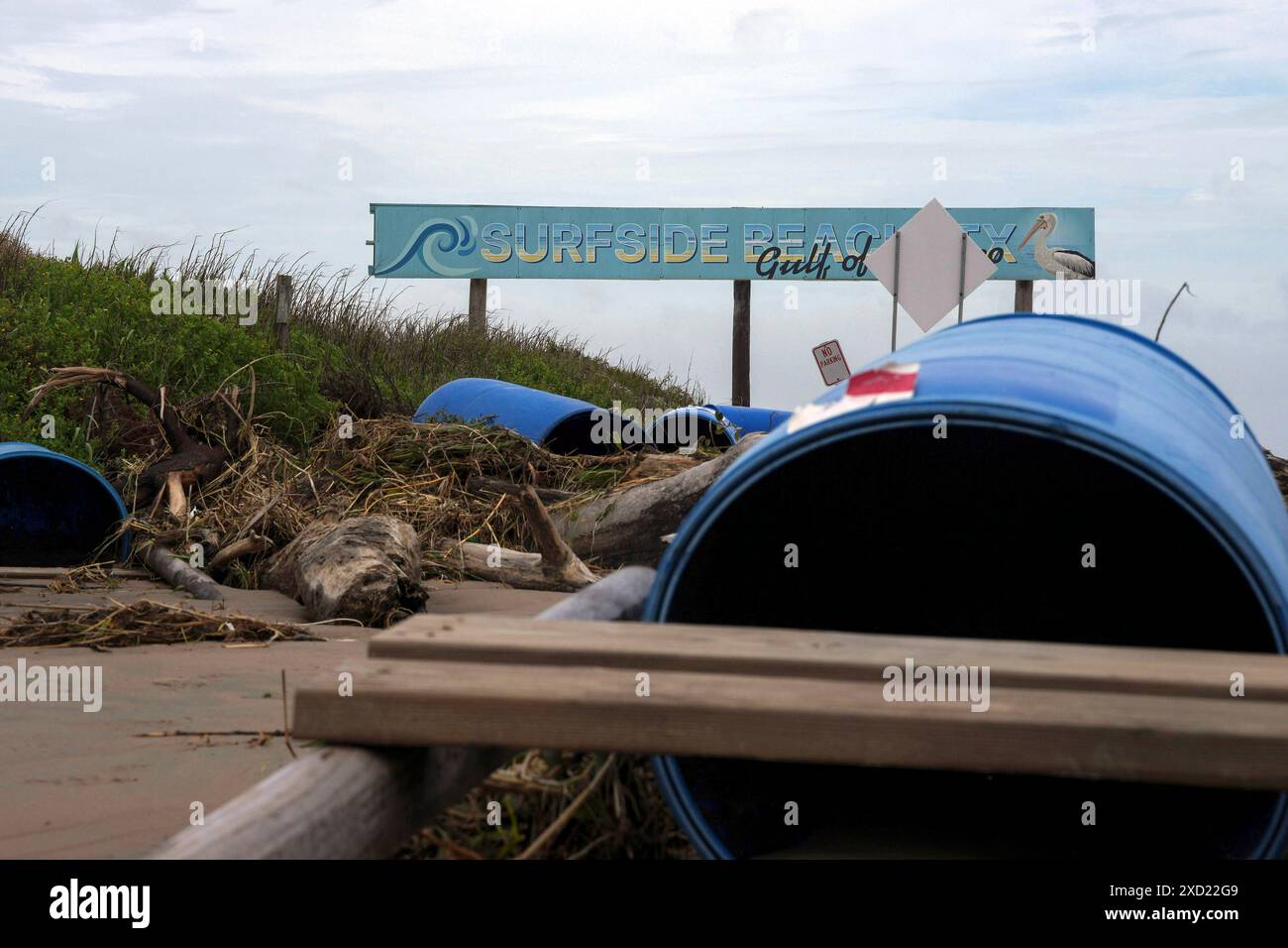 Trash cans litter the beach access road as Tropical Storm Alberto ...