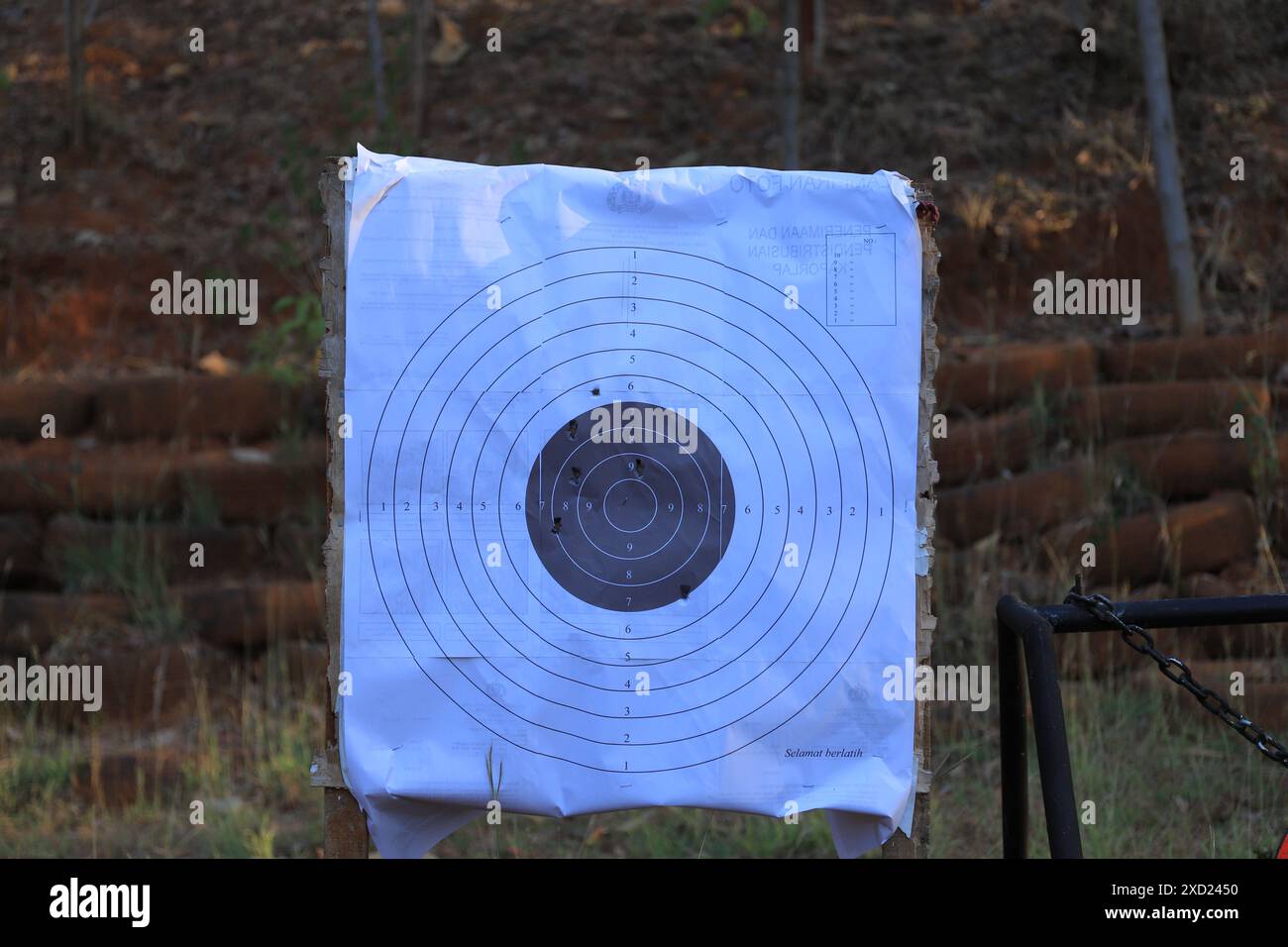 Close up of a shooting target and bullseye with bullet holes Stock ...