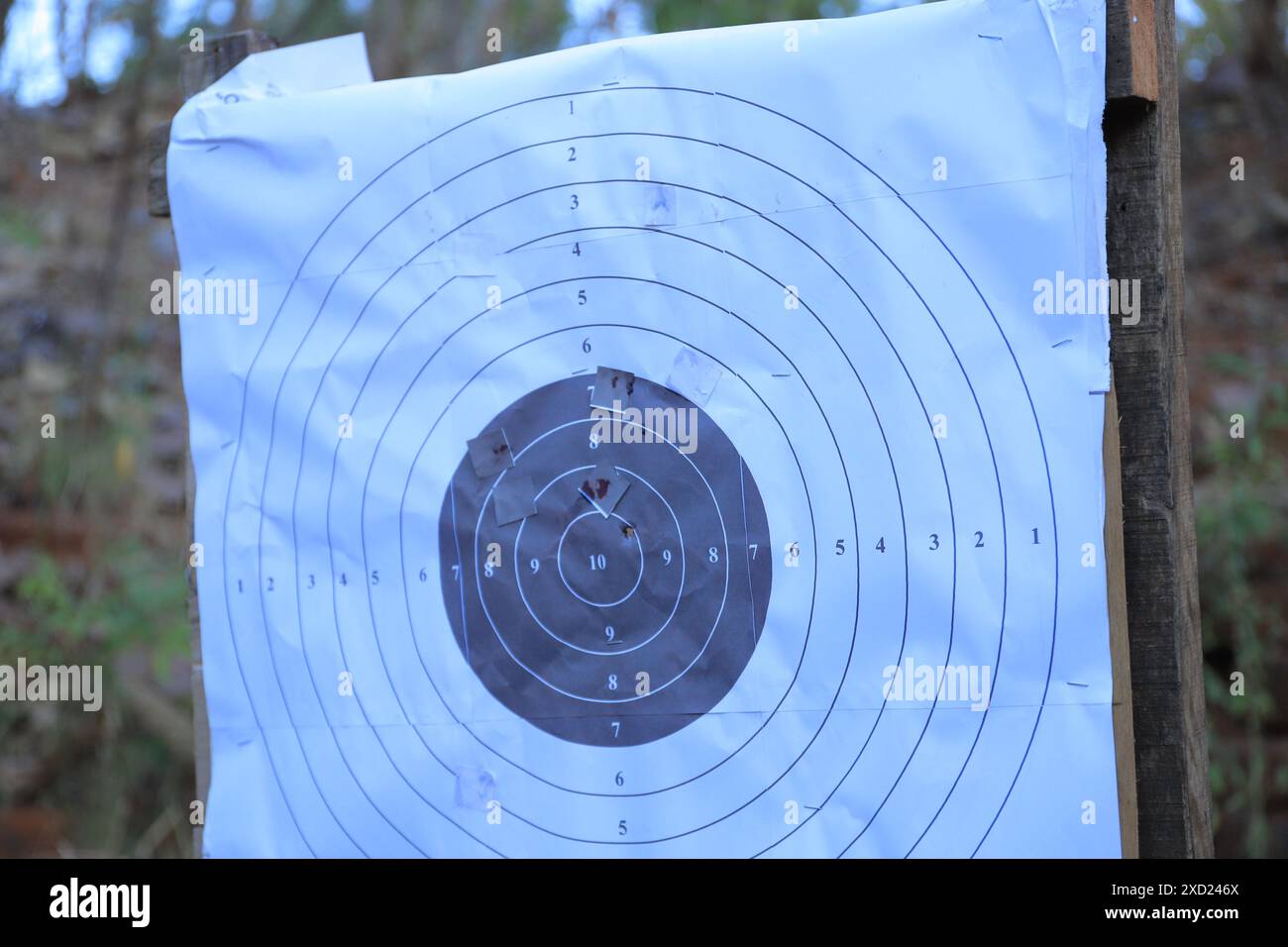 Close up of a shooting target and bullseye with bullet holes Stock ...