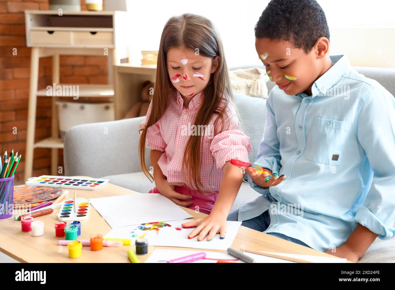 Cute little children drawing at home Stock Photo - Alamy