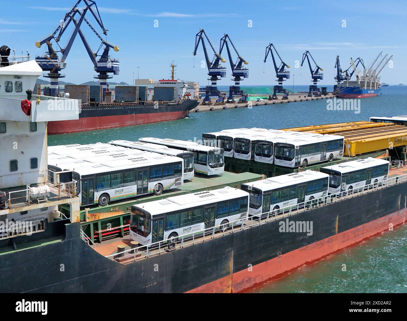 YANTAI, CHINA - JUNE 19, 2024 - Cargo ships loaded with export buses ...