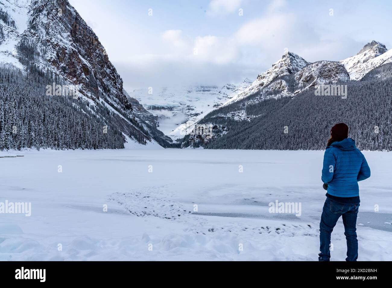 Lake Louise, Alberta, Canada - Man tourist standing beside the stunning ...