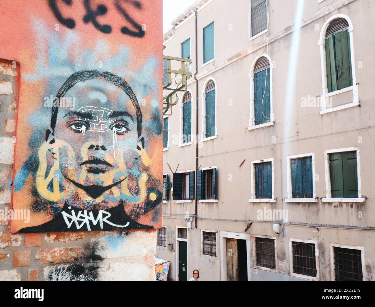 Venice, Italy - June 20th 2024 Large street art painting depicting a ...