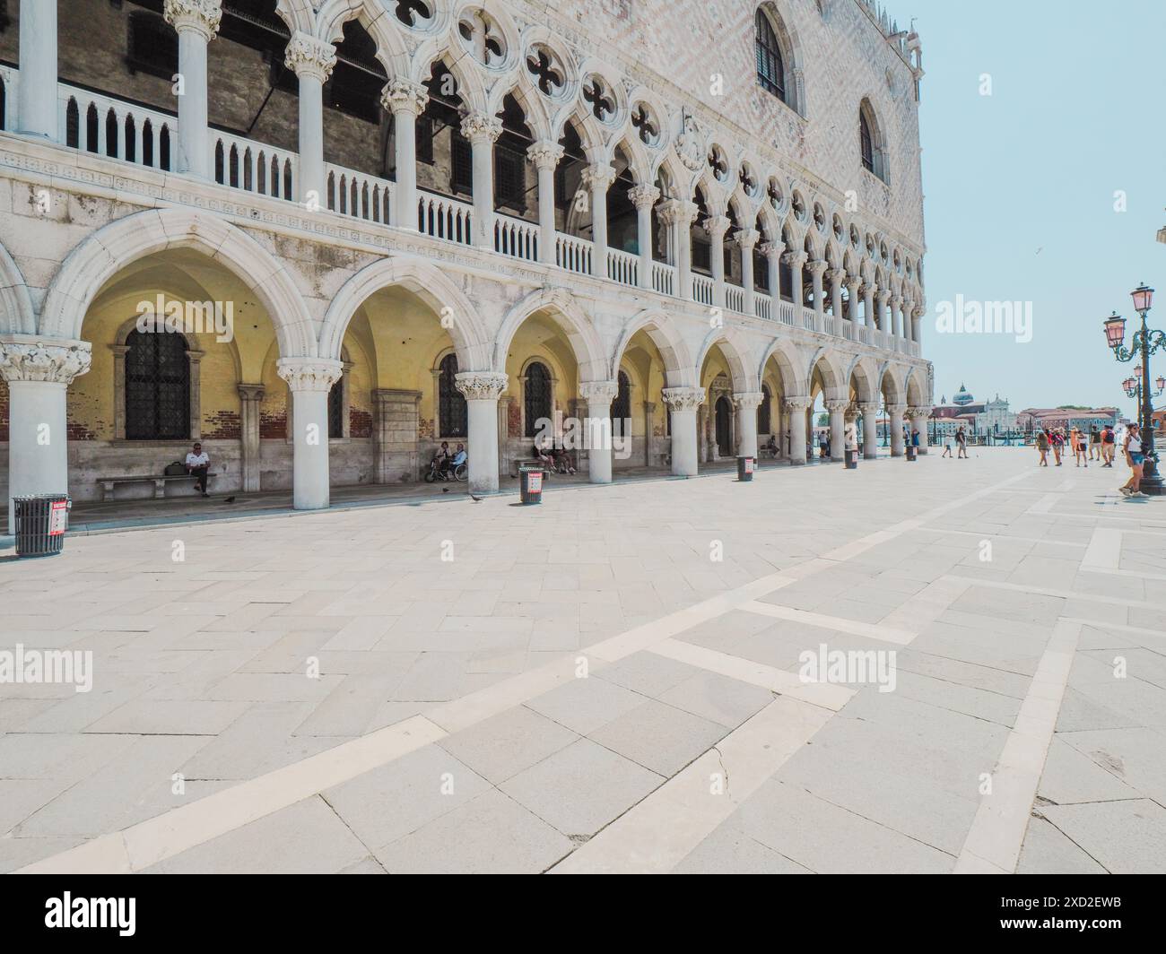 Venice, Italy - June 20th 2020 Visitors strolling on the cobblestone ...