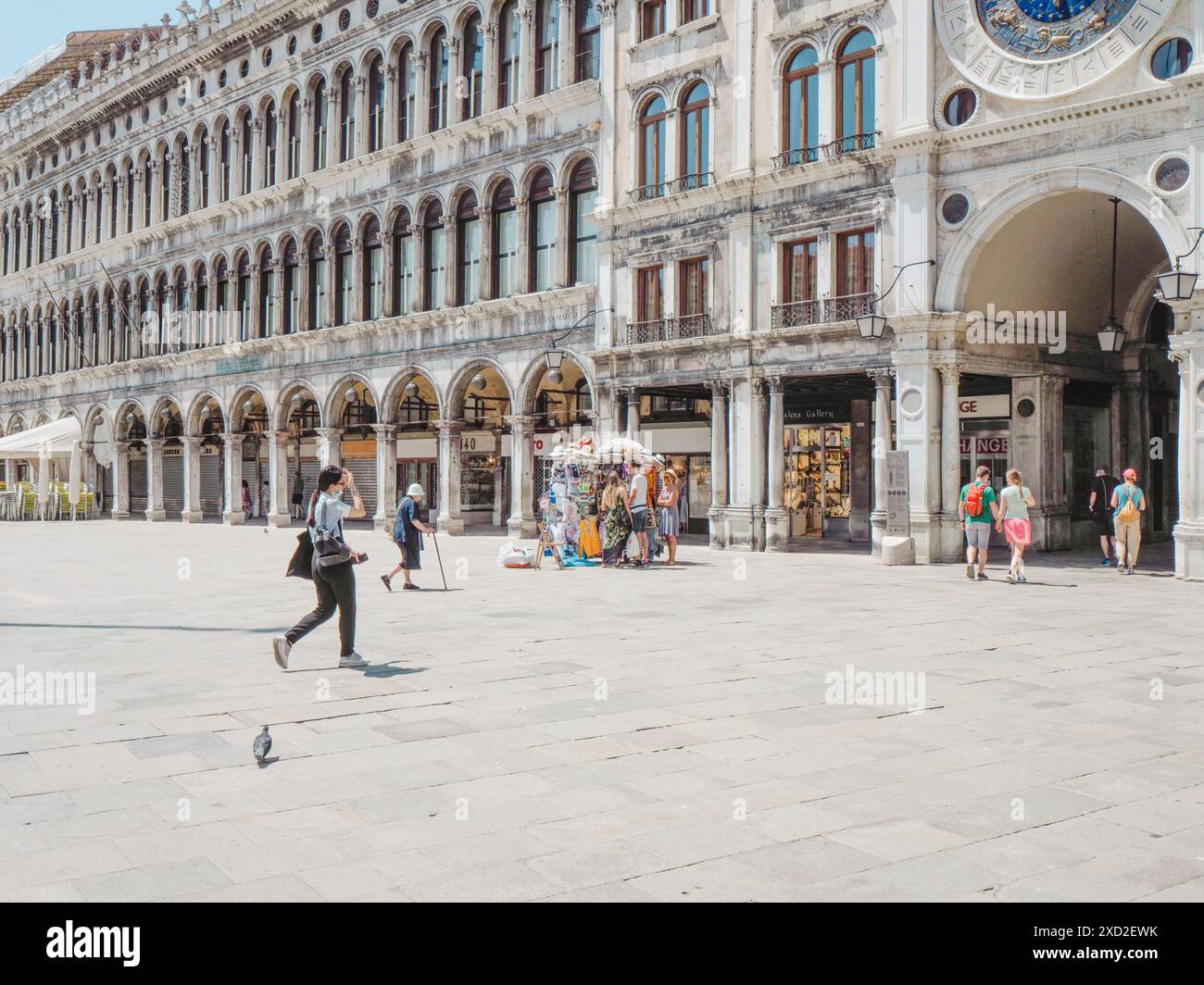 Venice, Italy - June 20th 2020 Tourists strolling through the iconic st ...