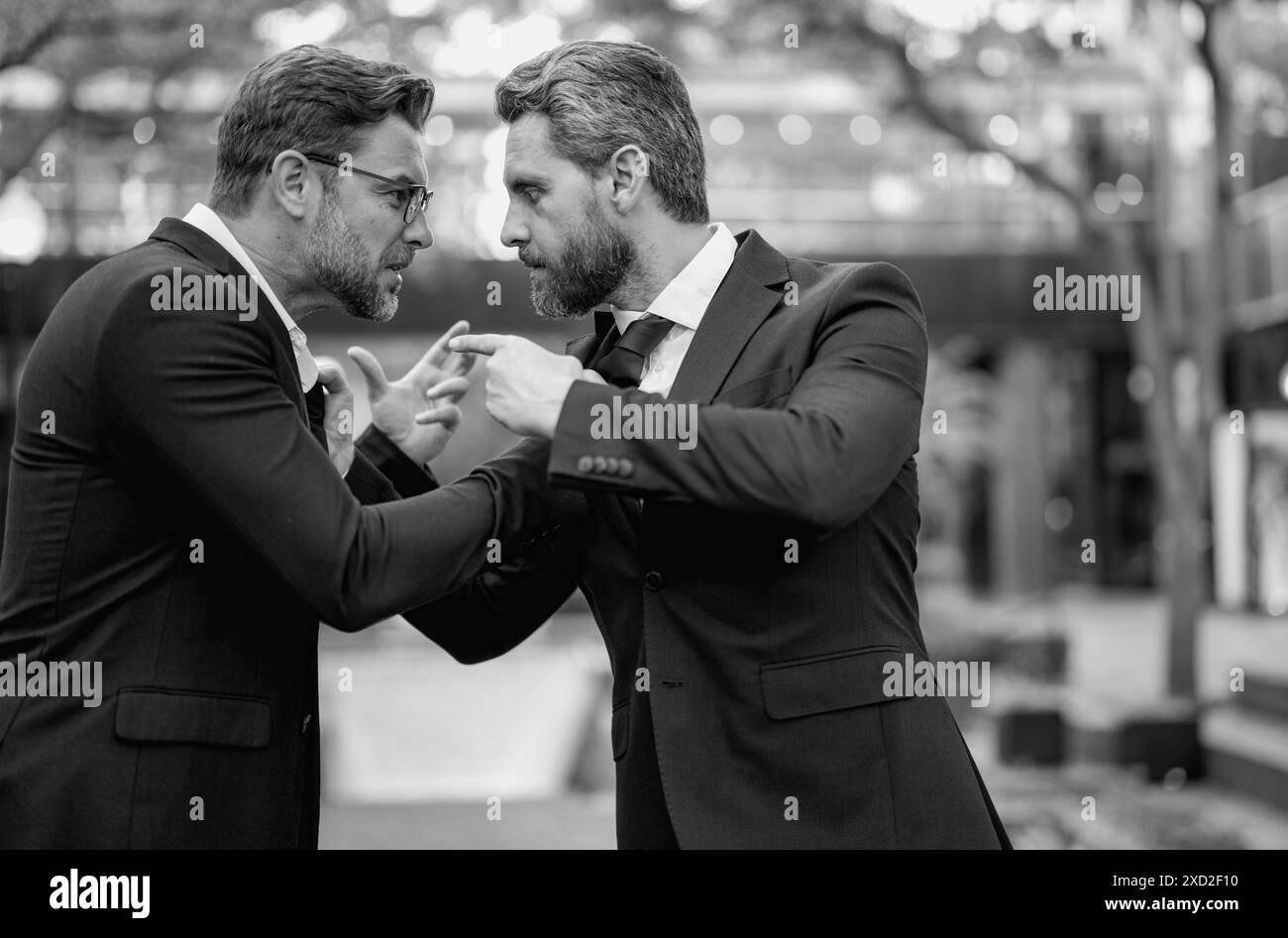 Man angry fight outside Black and White Stock Photos & Images - Alamy