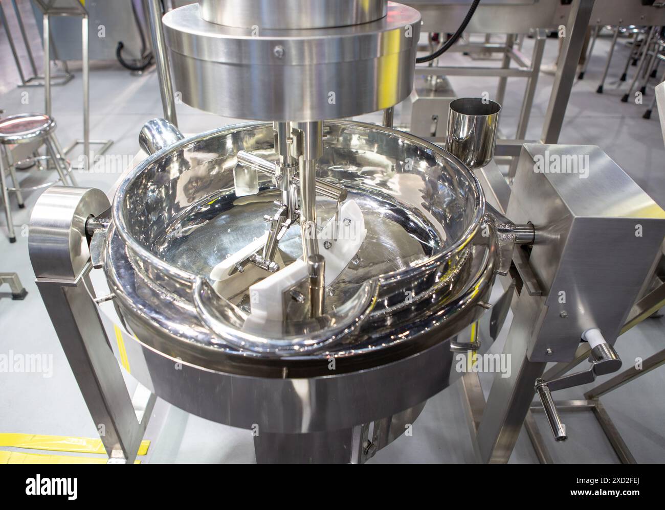 Blender machine large barrel mixing food ingredient. Food industry ...