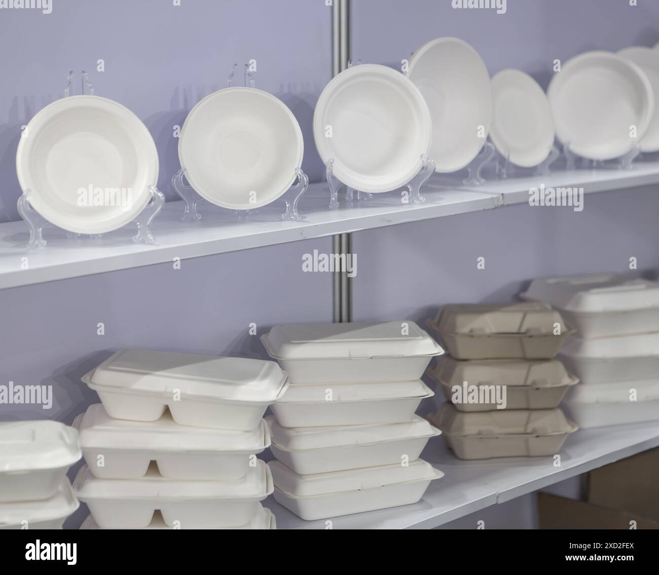 Food packaging container. Recycling food package on shelves Stock Photo ...