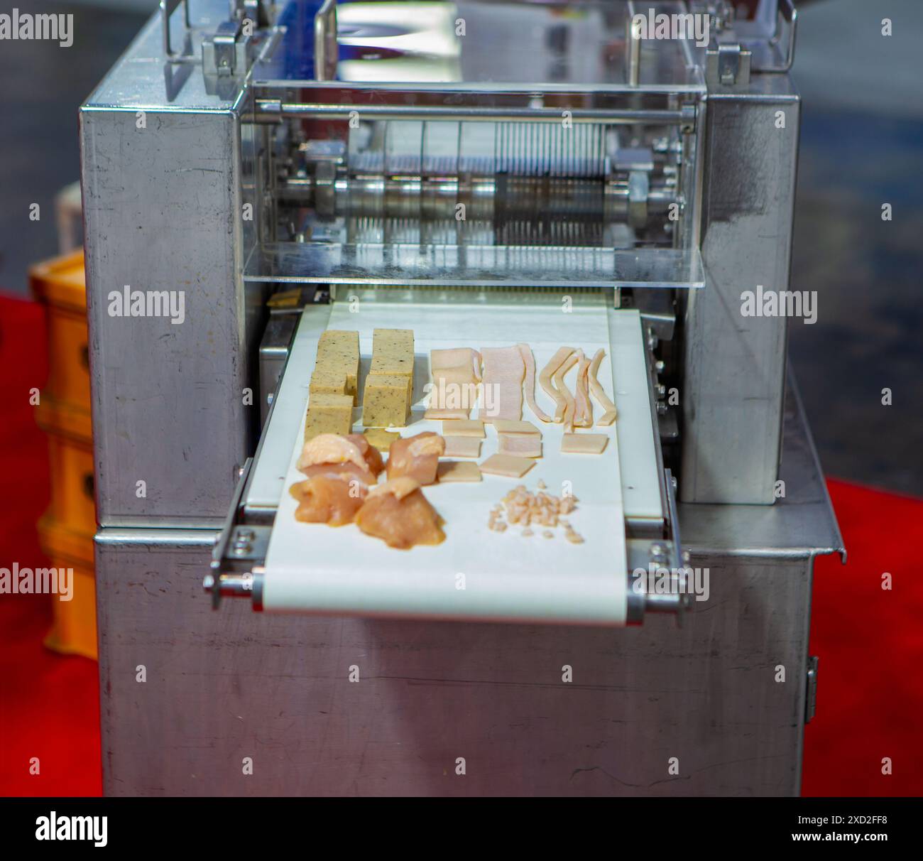 Commercial meat slicer machine. Food industry Stock Photo - Alamy