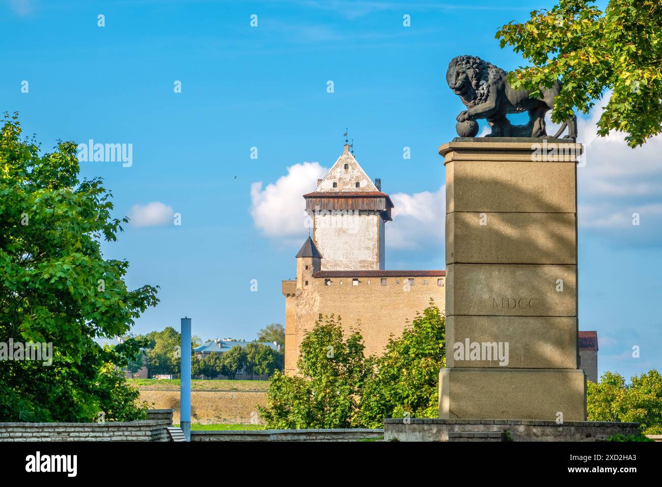 View to ‘Swedish Lion’ monument and Hermann Castle at backdrop. Narva ...