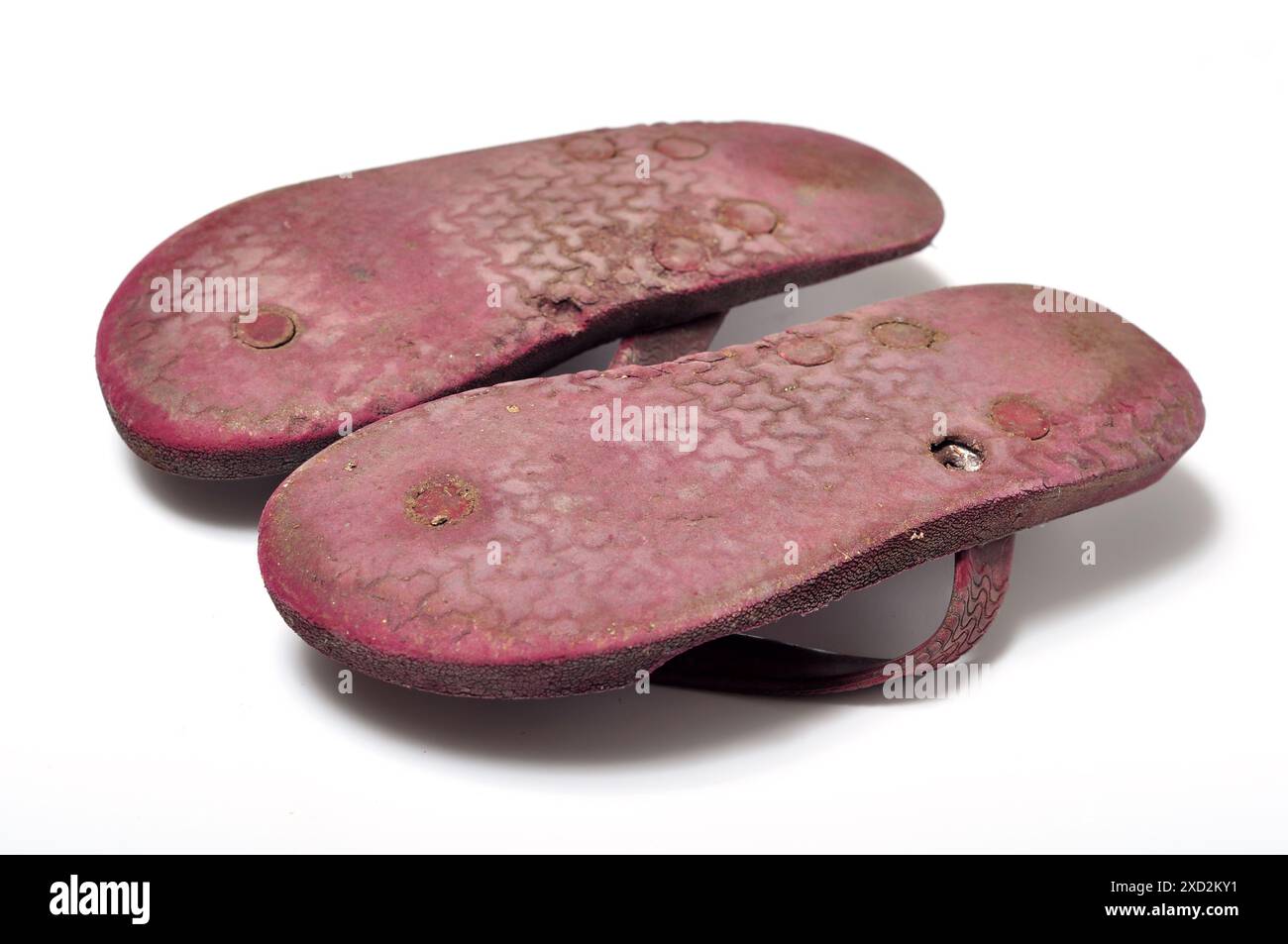 Worn and ugly flip flops on white background Stock Photo - Alamy