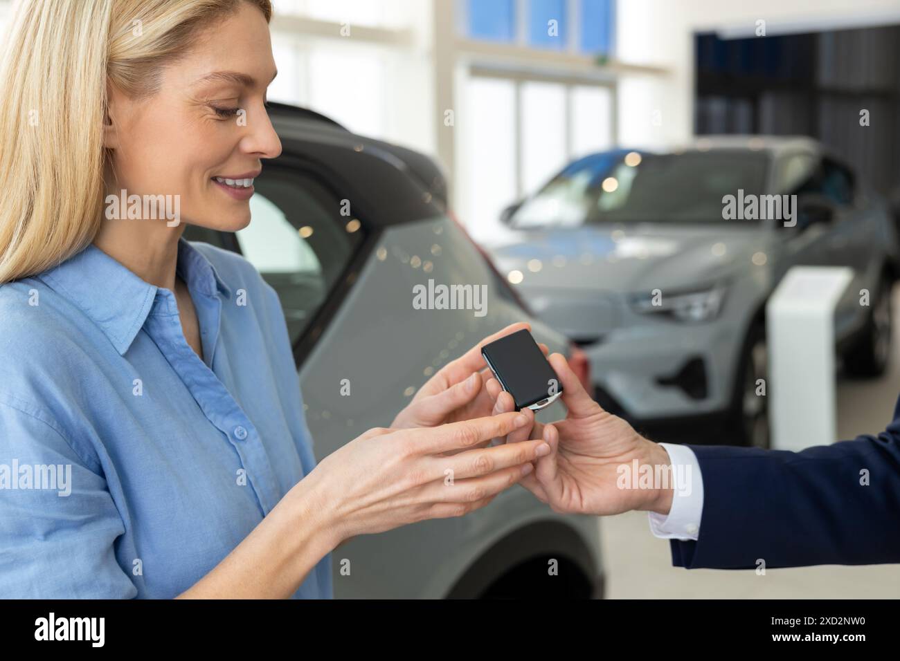 Vehicle dealer passing key hi-res stock photography and images - Alamy