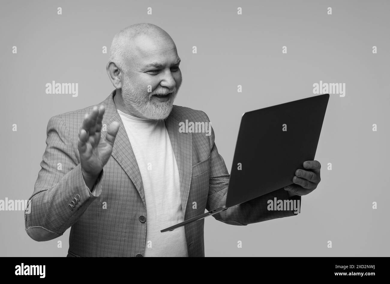 Older man hold laptop computer. 60s businessman using laptop pc ...
