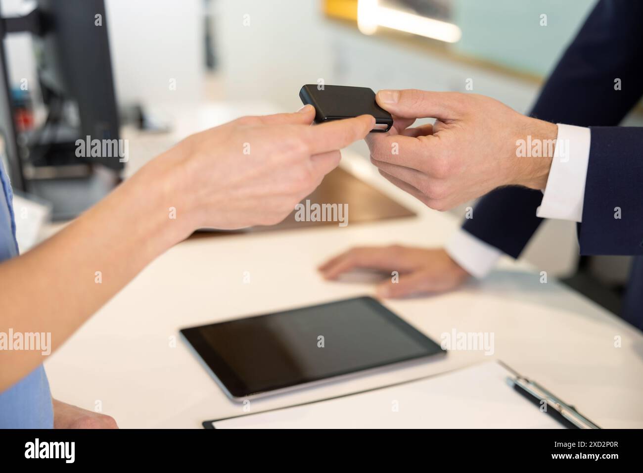 Close up picture of hands with passing the car keys Stock Photo - Alamy