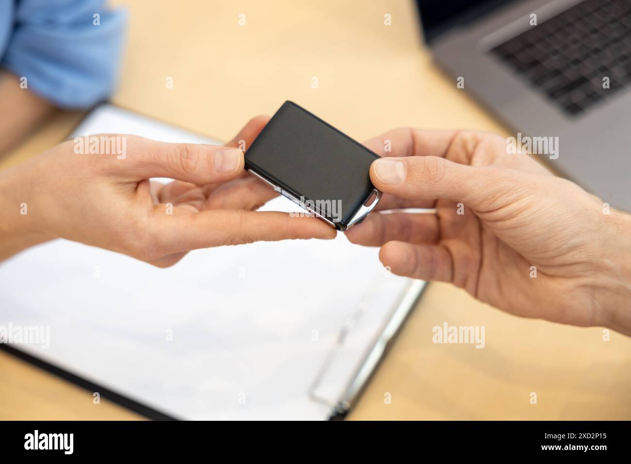 Close up picture of hands with passing the car keys Stock Photo - Alamy