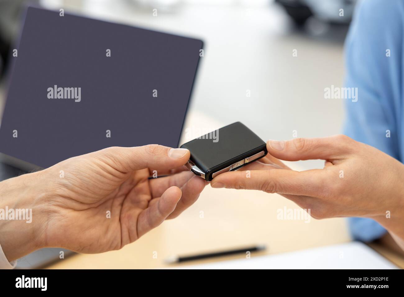 Hands passing car key hi-res stock photography and images - Alamy