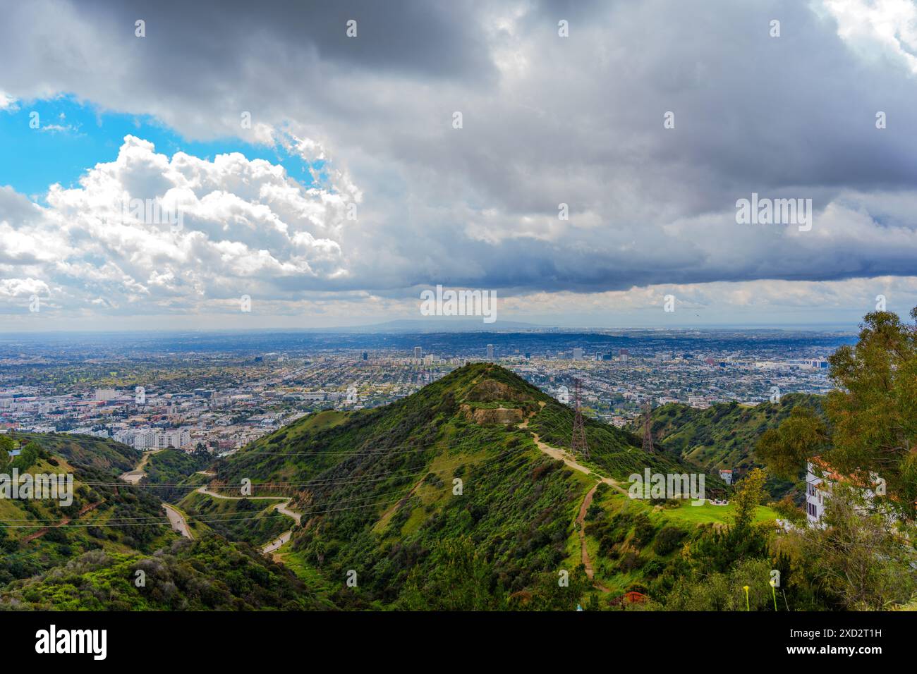 View of Runyon Canyon Park and the city panorama under an overcast sky ...