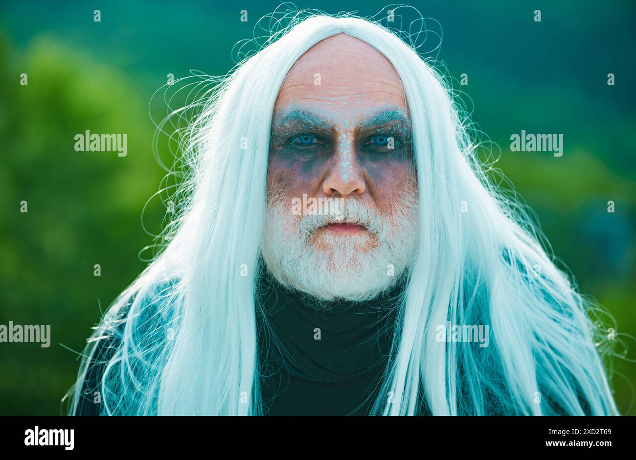 Bearded man dressed like Halloween monster. Devil man on Halloween ...