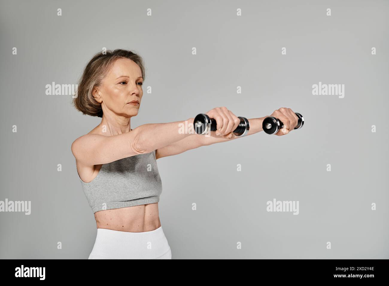 Dumbbell exercises for elderly hi-res stock photography and images - Alamy