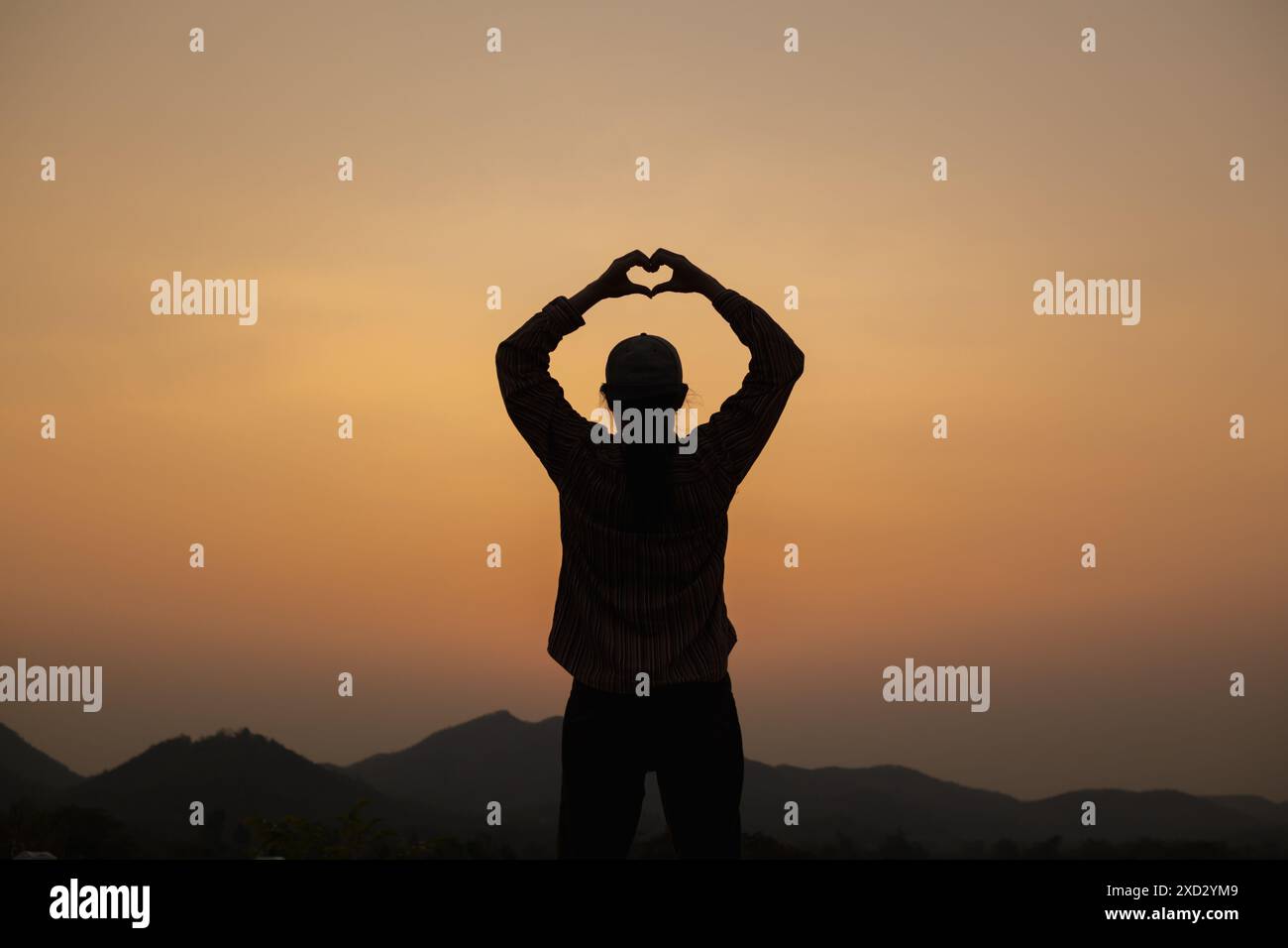A young man uses sign language to express his love and friendship to ...