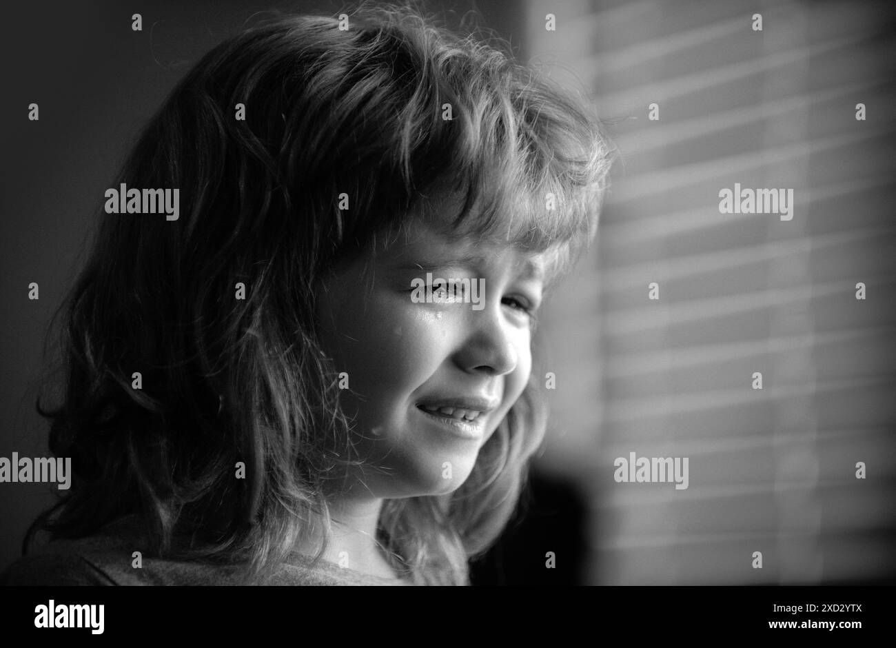 Crying kid boy. Sad Child with tears at Home Stock Photo - Alamy