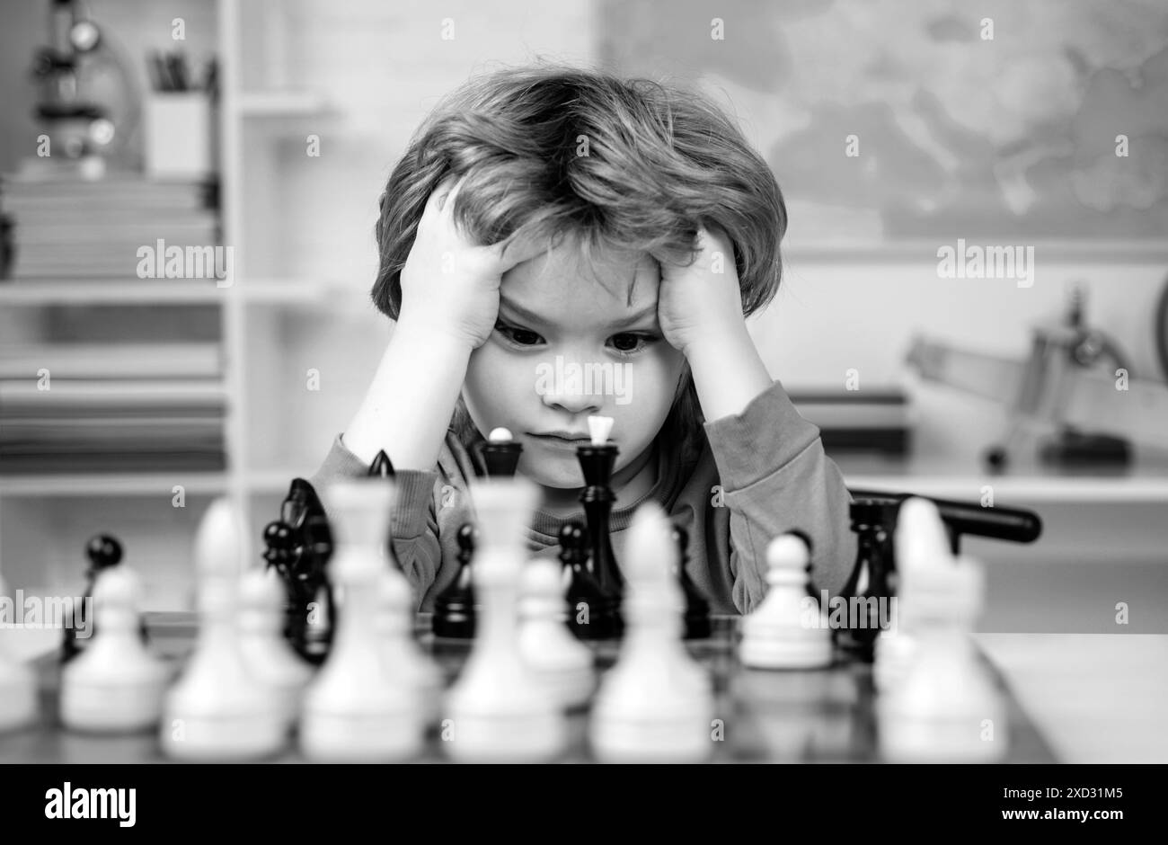 Boy think or plan about chess game, vintage style for education concept ...