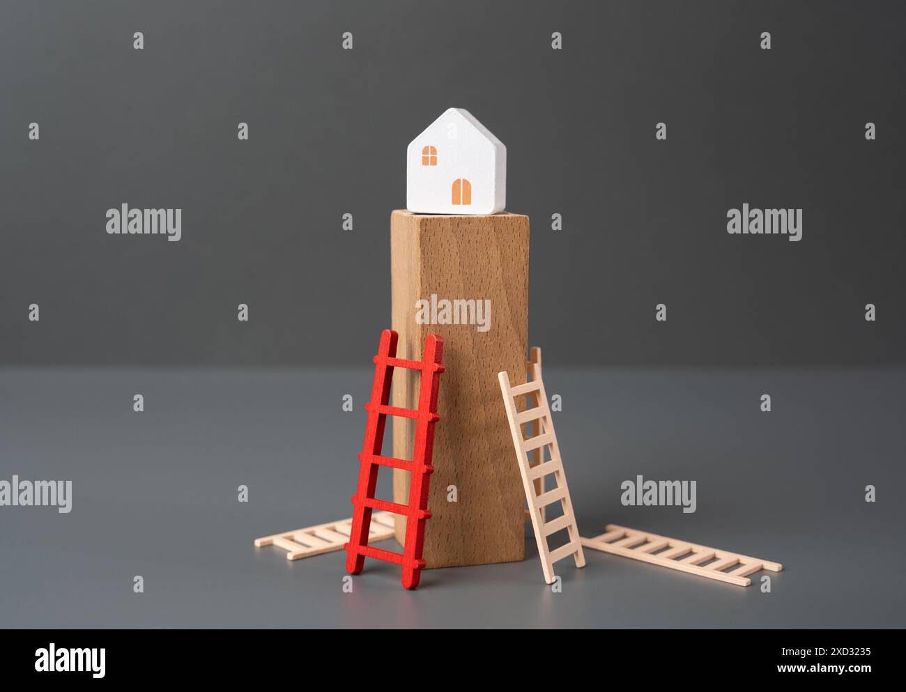 The house is on a pedestal and stairs symbolizing the mortgage for its ...