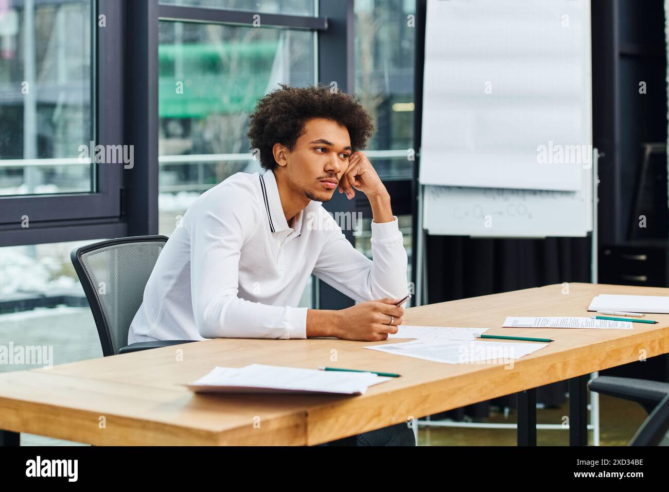 Young focused african employee man hi-res stock photography and images ...