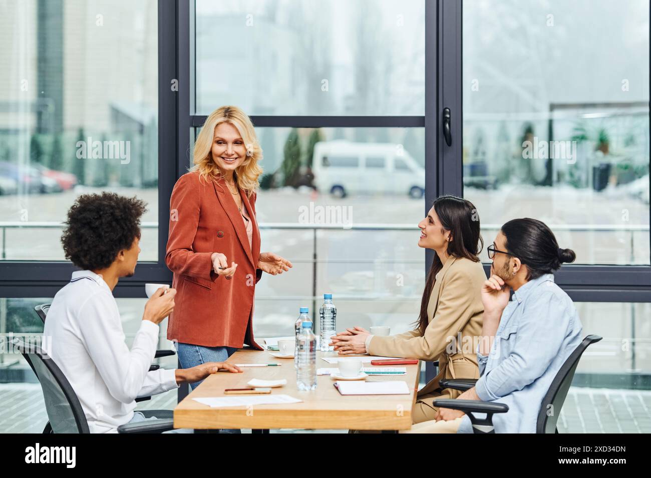 Professionals discussing in a conference room Stock Photo - Alamy
