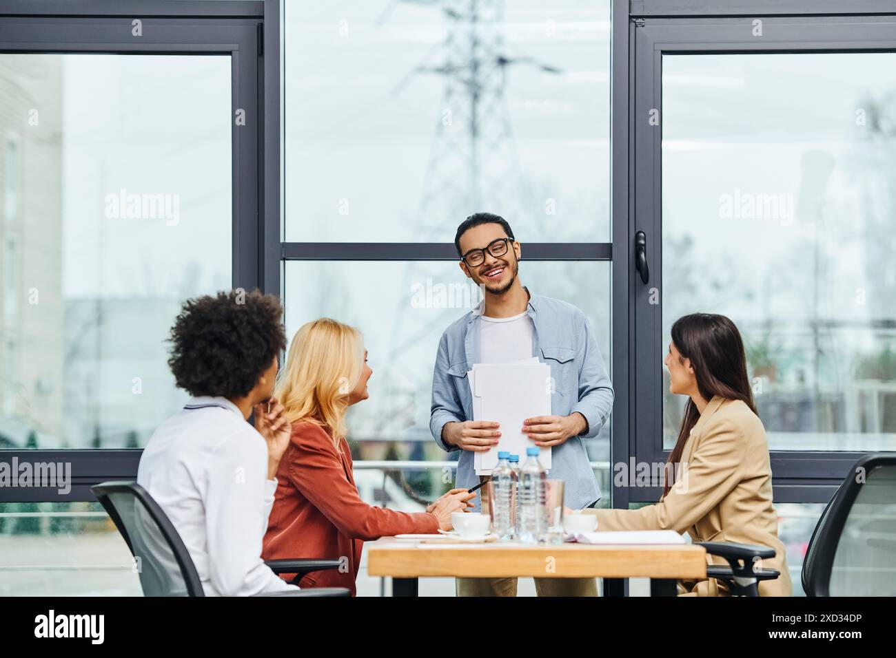 Group of professionals discussing business ideas around office table ...
