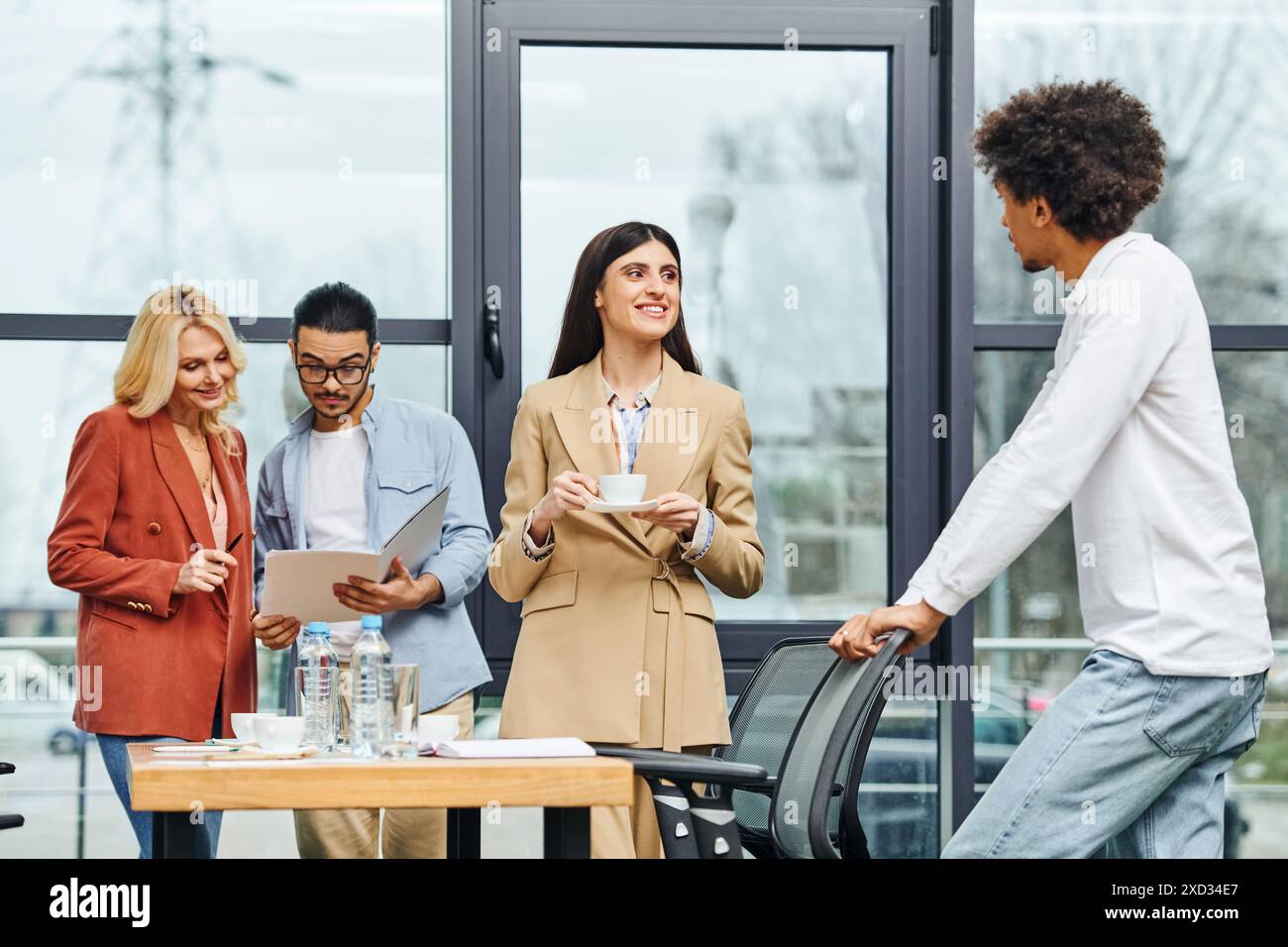 Business people engage in animated discussions in a modern office ...