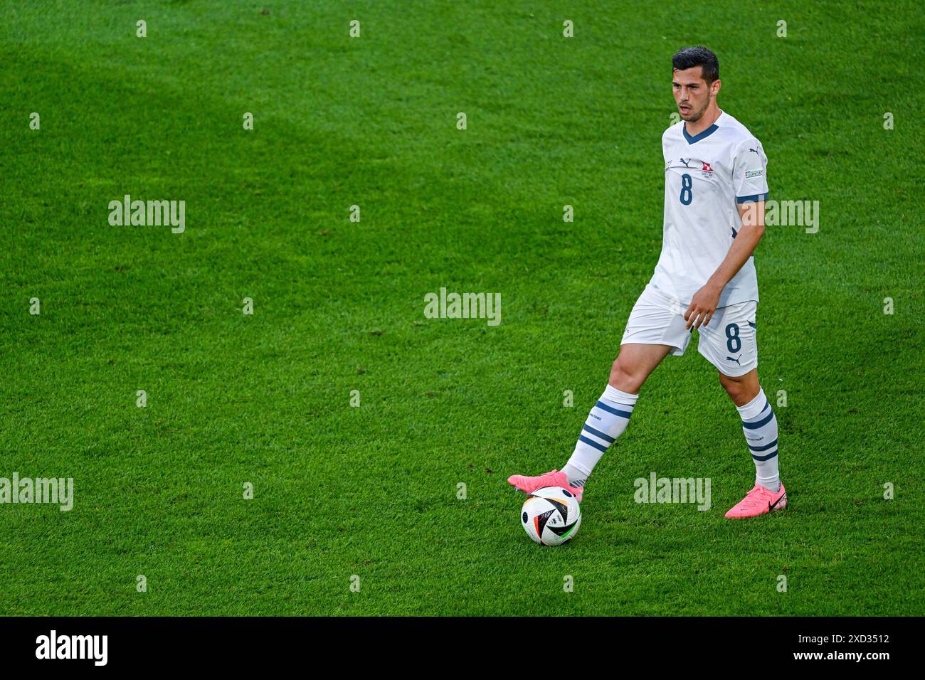 Cologne, Germany. 19th June, 2024. Remo Freuler (8) of Switzerland ...
