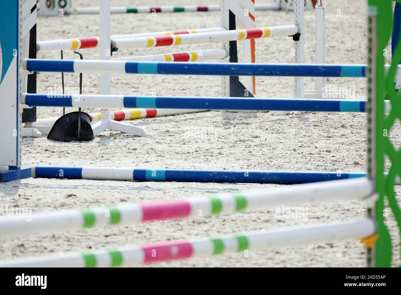 Show jumping poles obstacles, barriers, waiting for riders on show ...