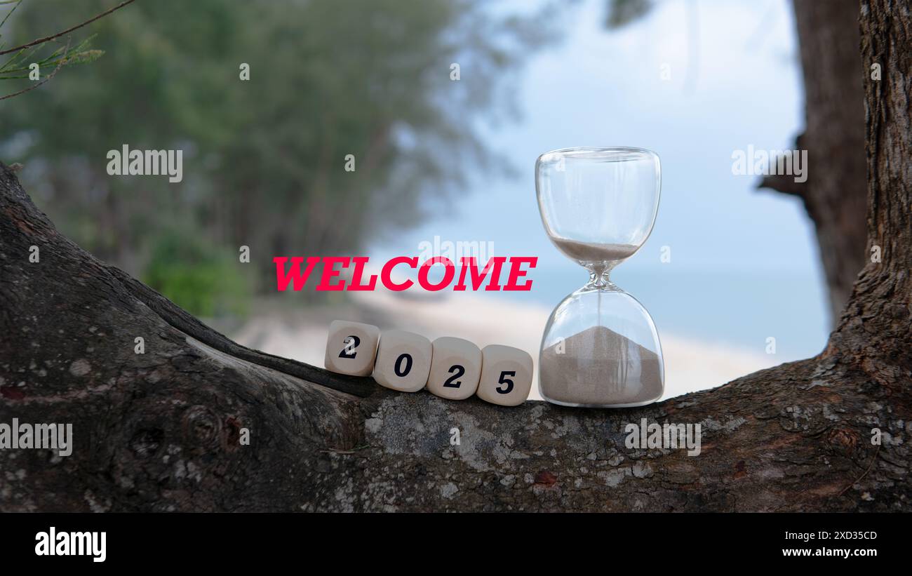 An hour glass with a dice cube and a text 2025 as a symbolic that the ...