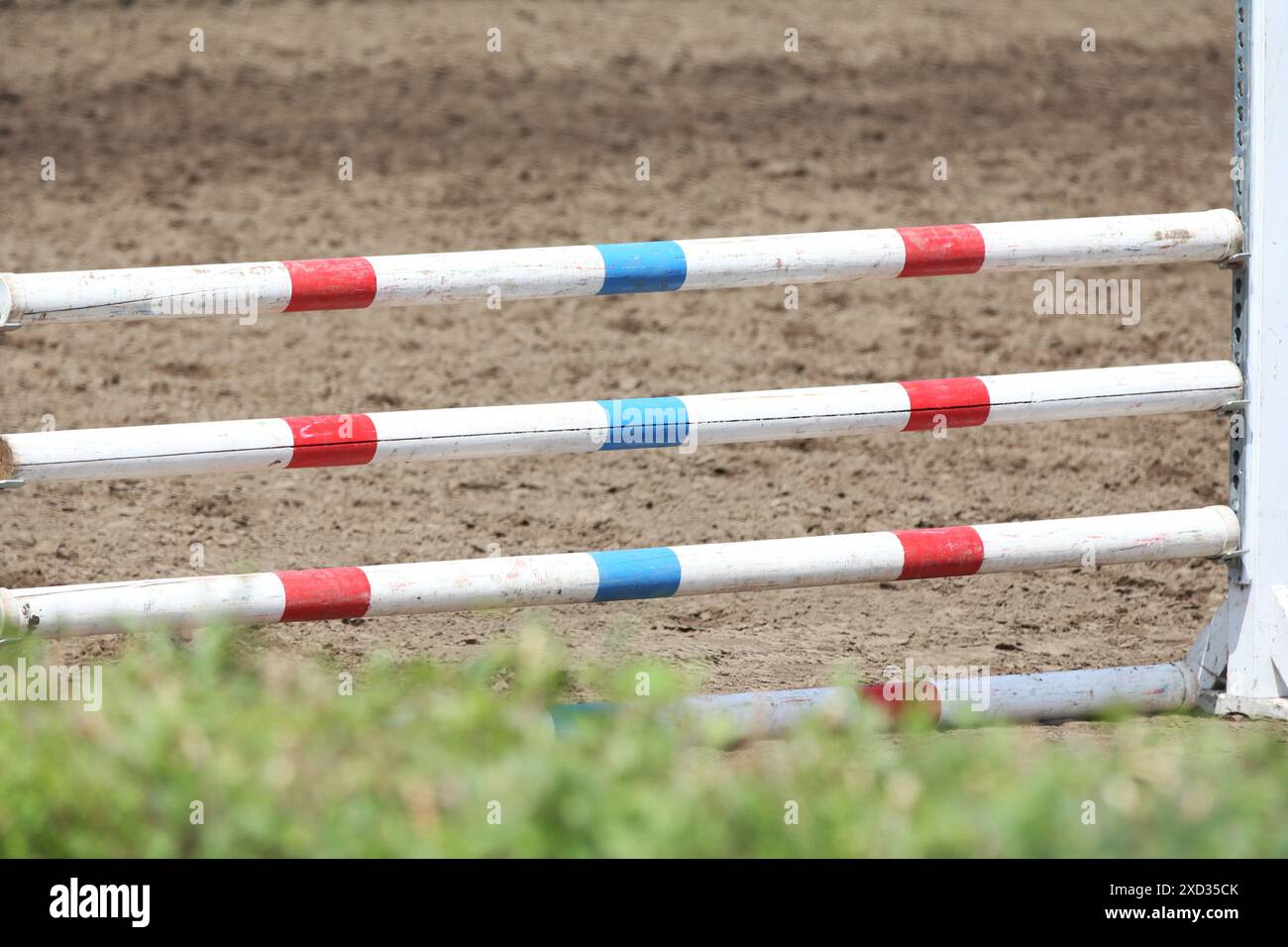 Show jumping poles obstacles, barriers, waiting for riders on show ...